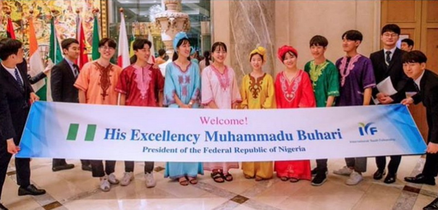 Japan nationals rock Nigerian attire to welcome President Buhari ...