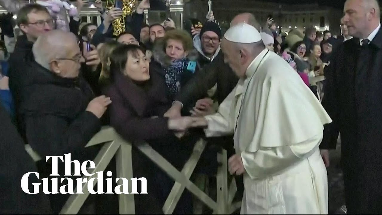 Watch: Pope Francis slap woman's hand to free himself at New Year's Eve ...