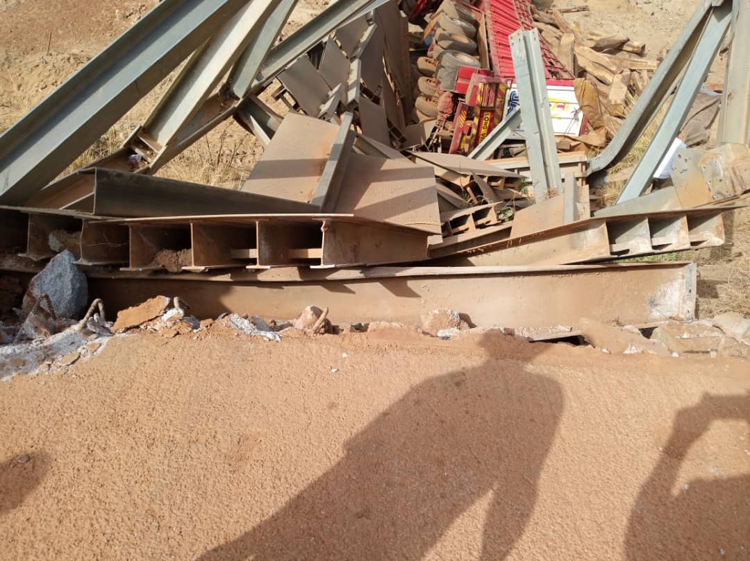 Passengers escape unhurt after steel bridge over river collapses ...