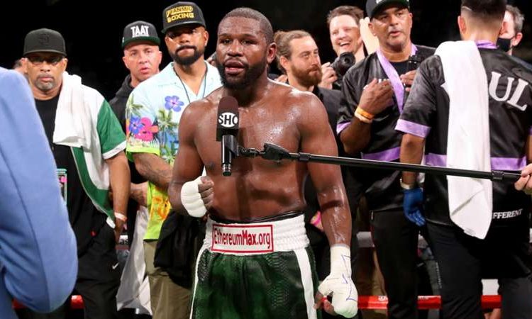 Mayweather knocks out opponent to bag $20 million in nine minutes in ...