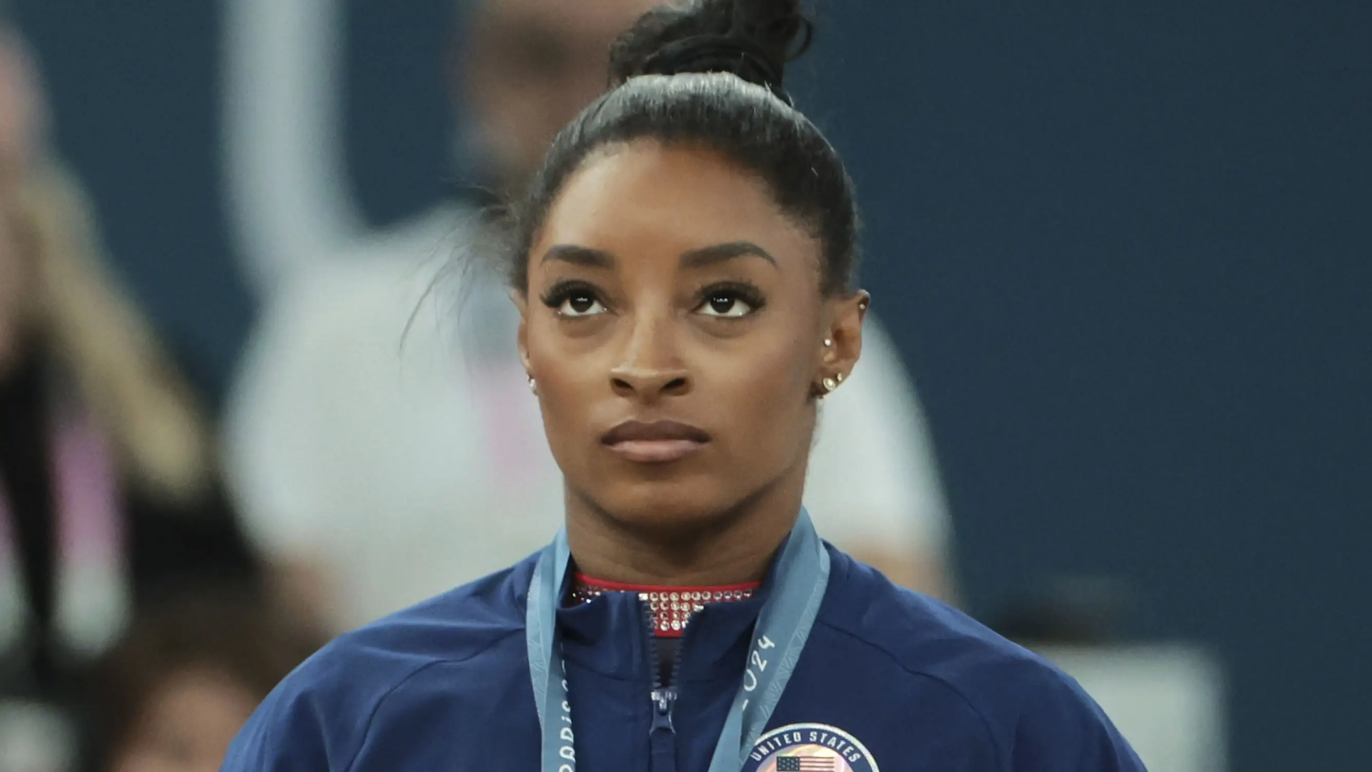 Simone Biles reacts after her mother's plea for forgiveness over ...