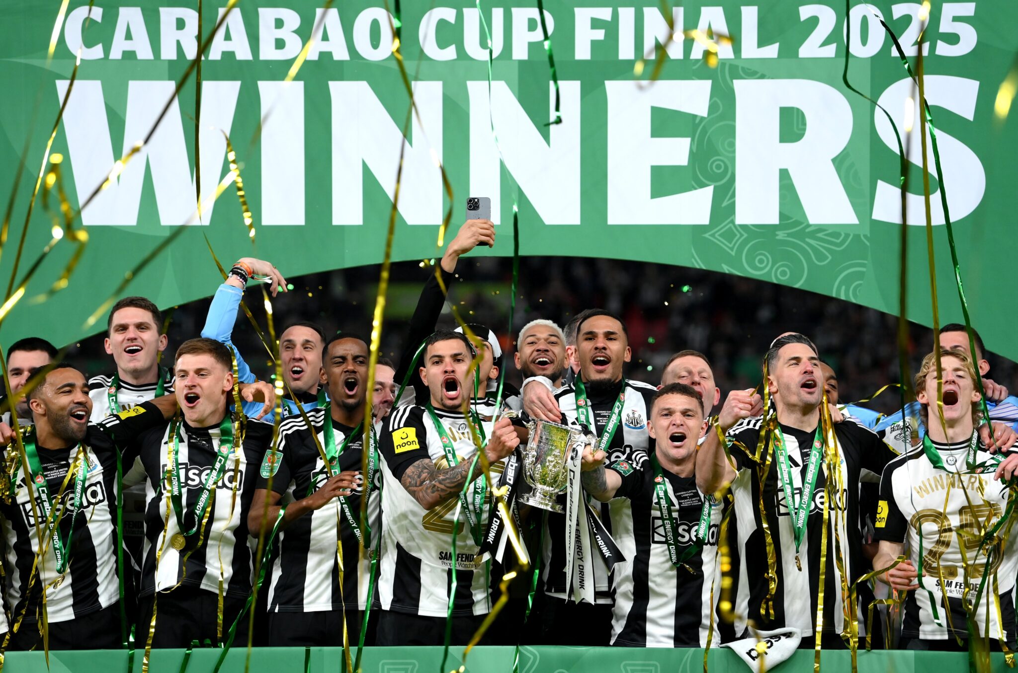 Newcastle hold off Liverpool to claim first major trophy since 1969 ...
